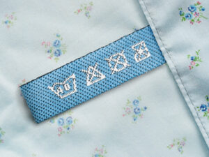 11 Tips On Vintage Tags: How To Read Vintage Clothing Labels
