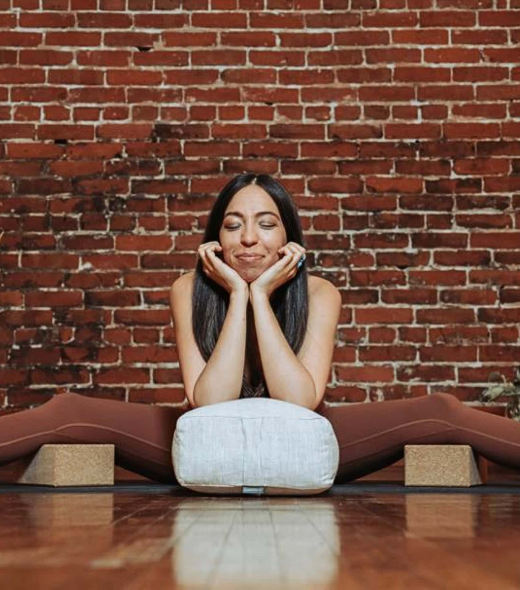 7 Sustainable Yoga Props & Accessories To Bolster Your Practice