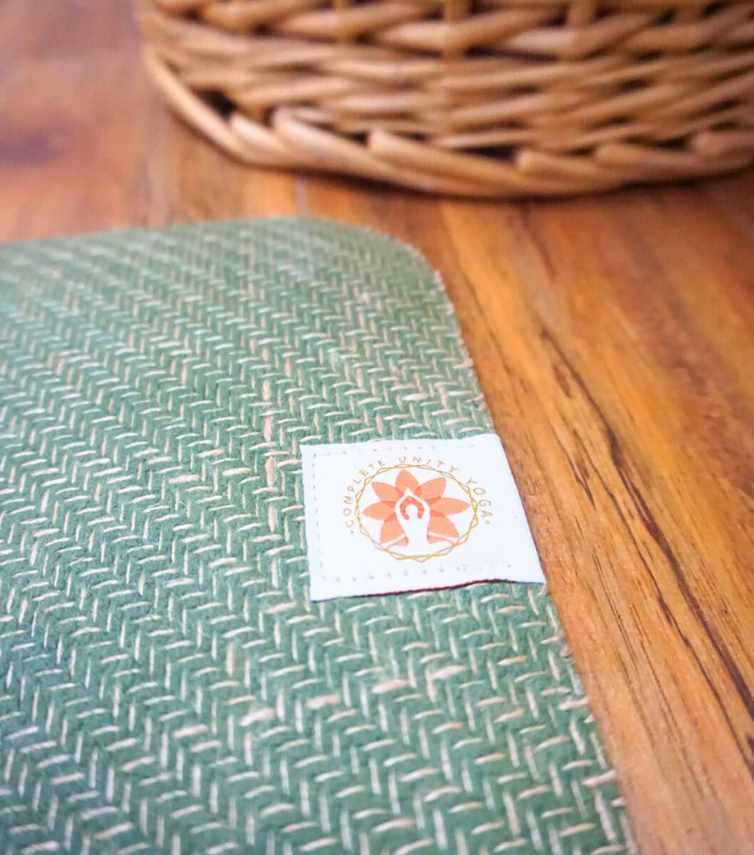 7 Sustainable Yoga Props & Accessories To Bolster Your Practice